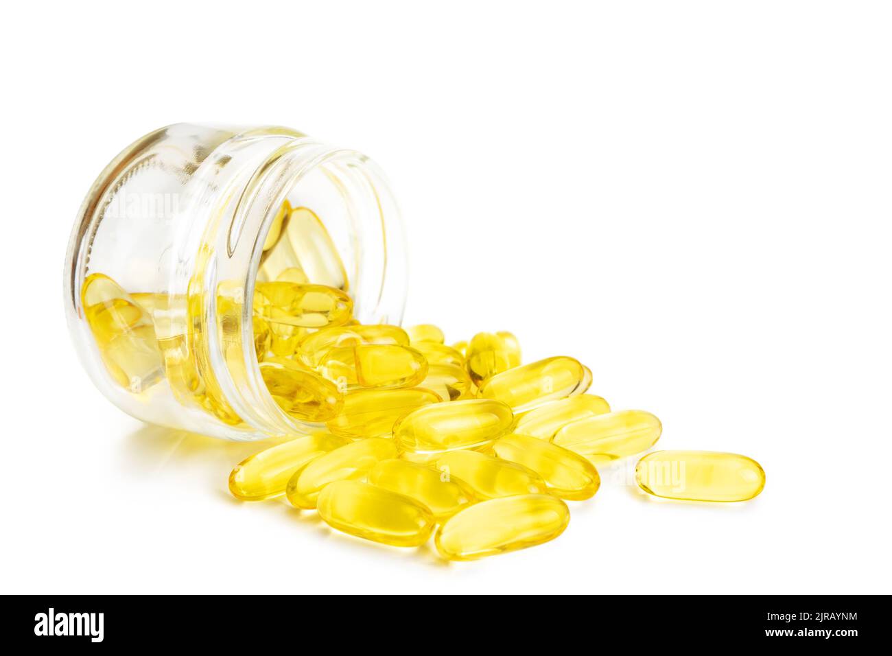 Pile of softgels capsules Omega 3 in bottle isolated on white ...