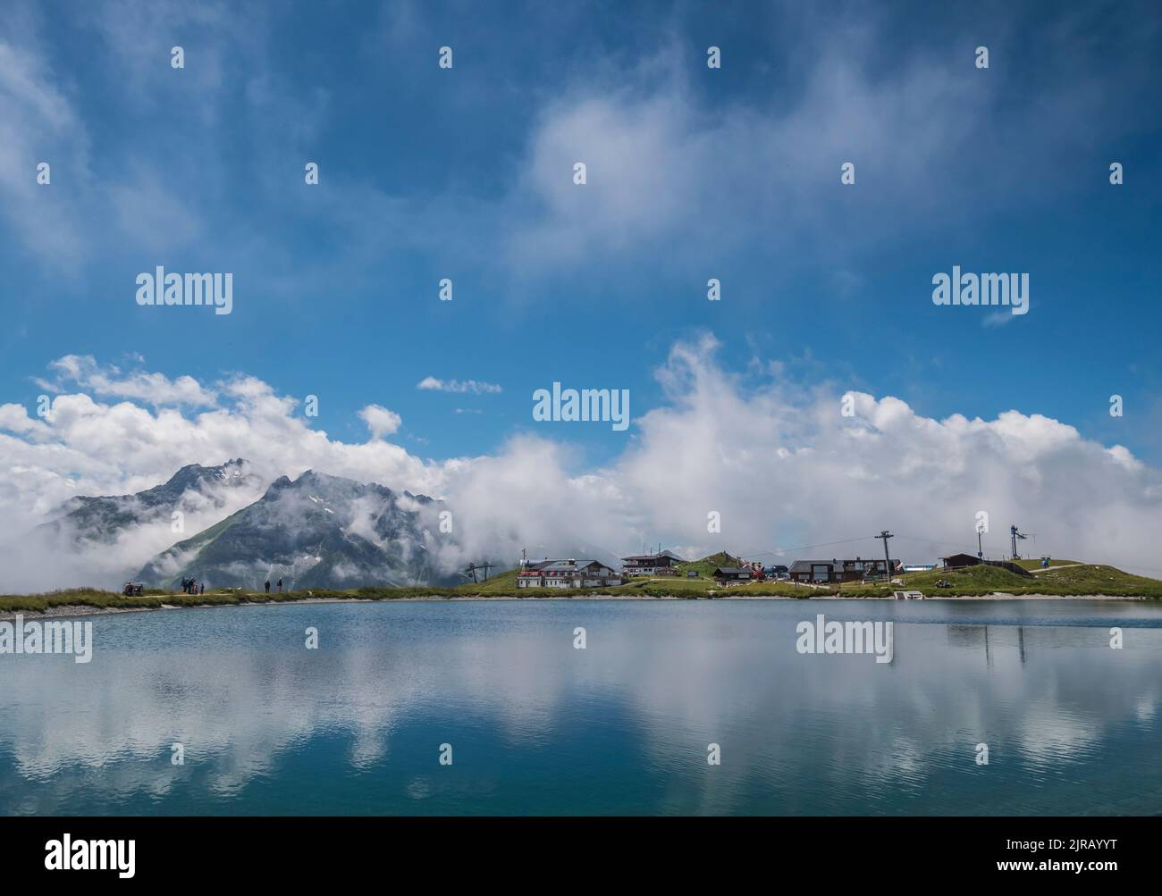 This cloudscape of Penkenjoch See at the Penkenjoch recreational area ...