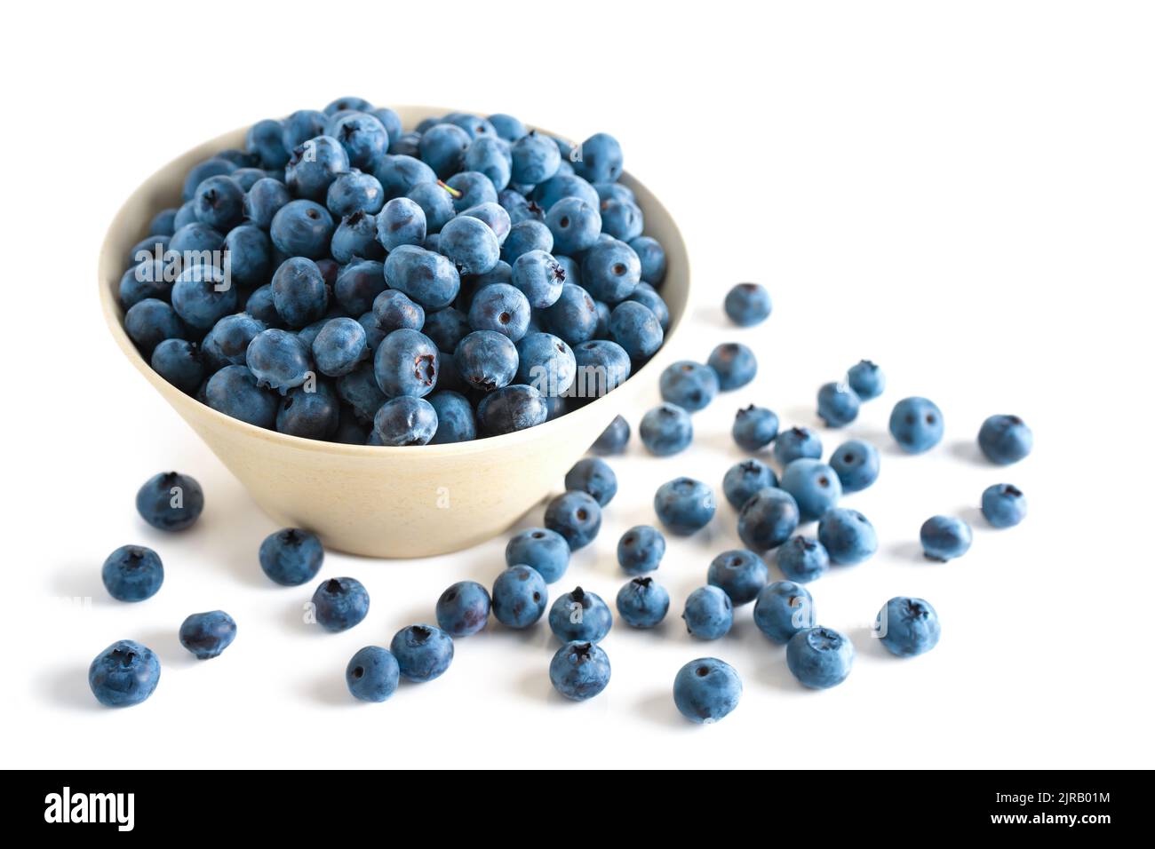 Fresh ripe organic blueberries in bowl on isolated on white background ...