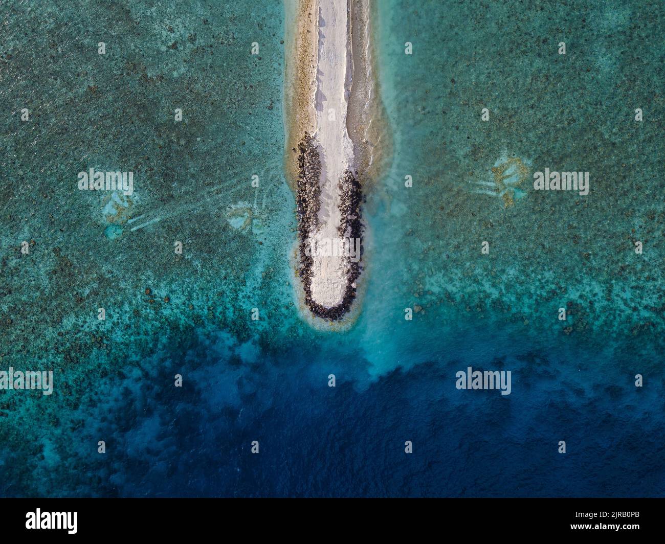 Maldives, Kaafu Atoll, Himmafushi, Aerial view of retaining wall at end ...