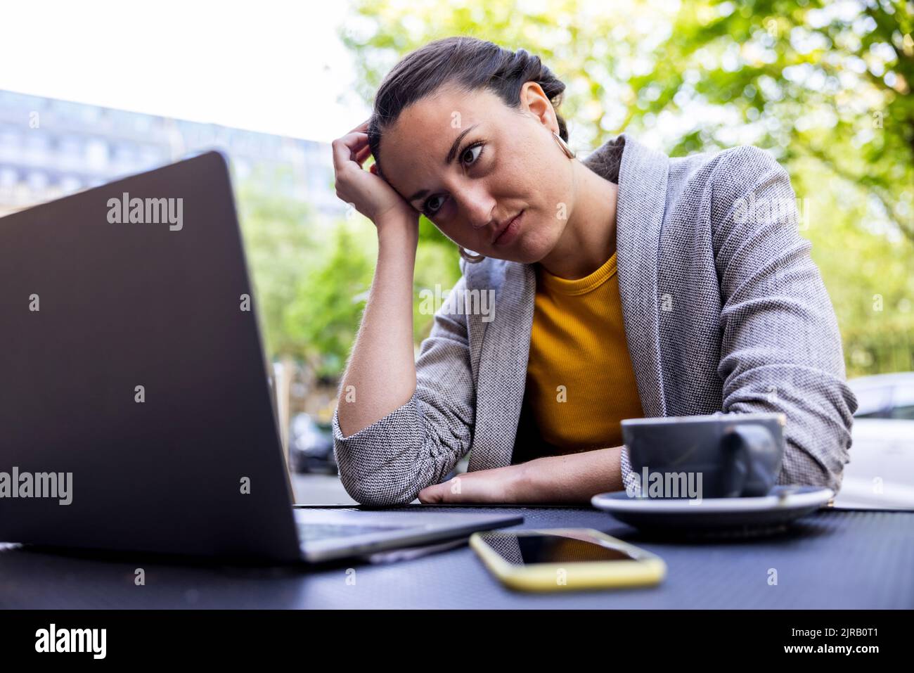 Staring at laptop hi-res stock photography and images - Alamy