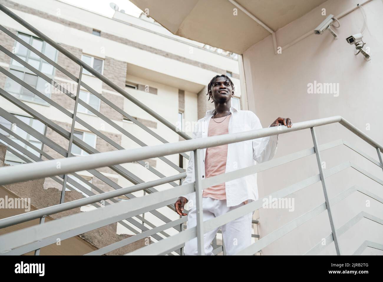 Low angle photography man walking hi-res stock photography and images ...