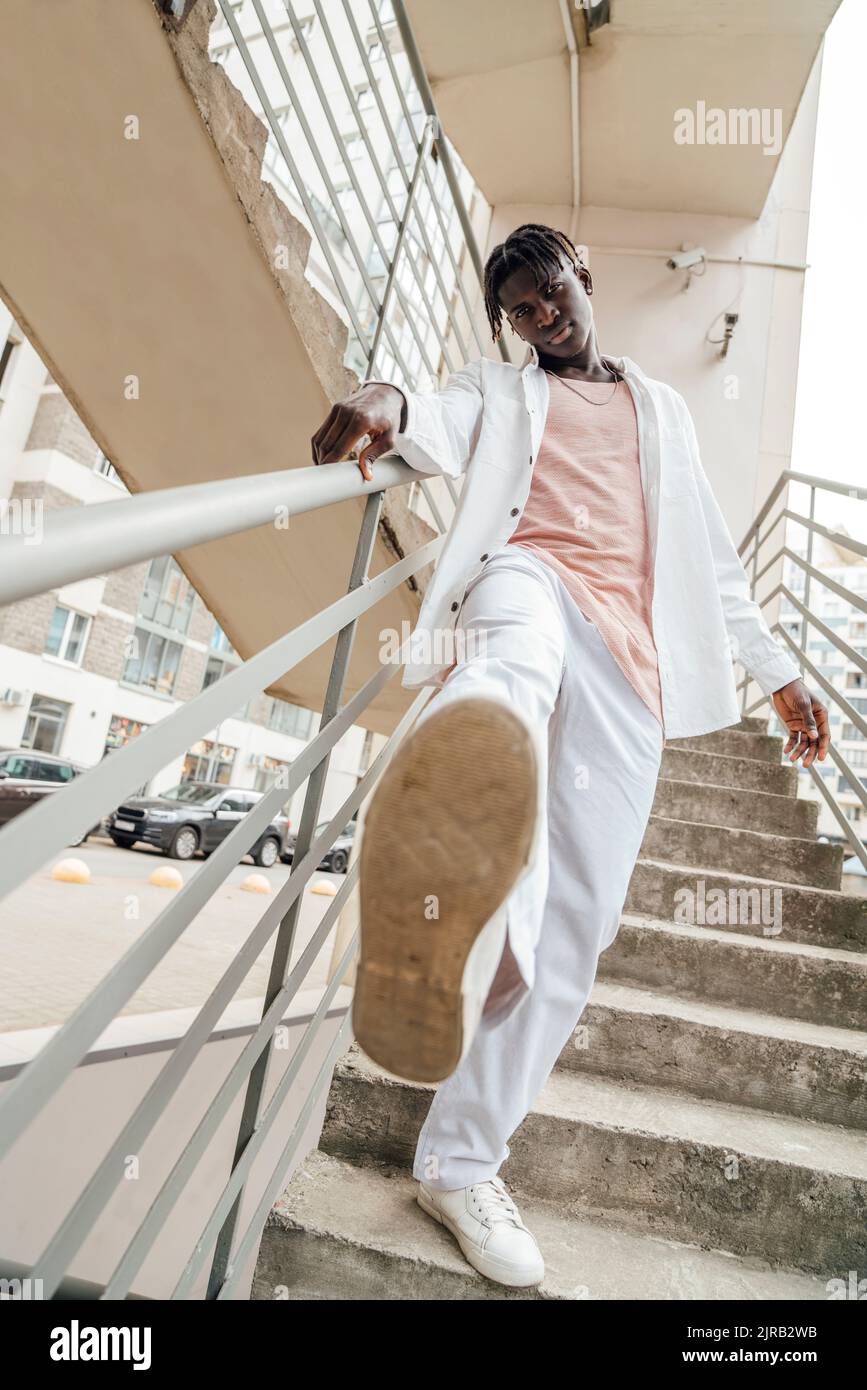 Man standing steps hi-res stock photography and images - Alamy