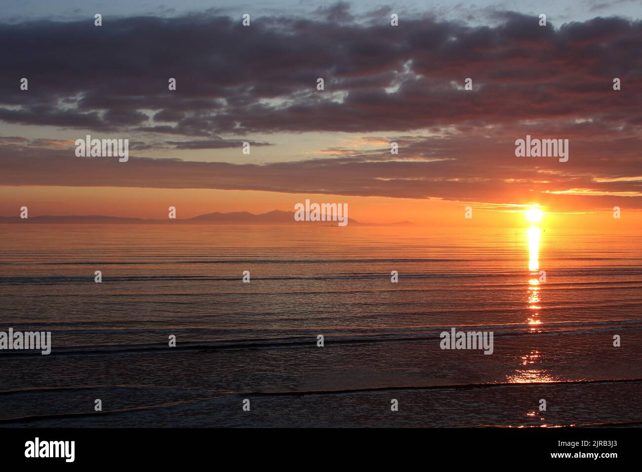 Prestwick, Ayrshire, Scotland, UK. The sun sets of the Firth of Clyde ...