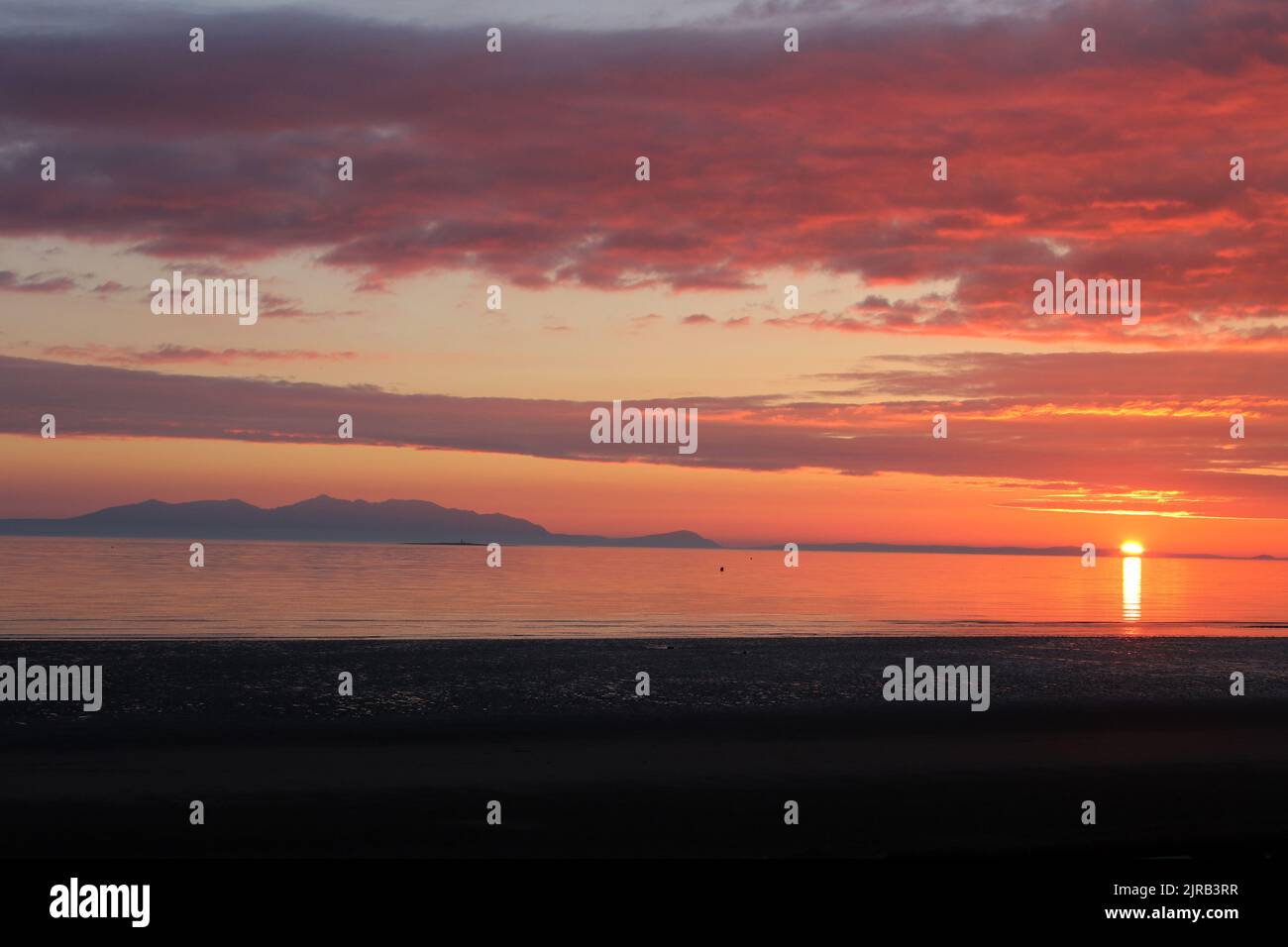 Prestwick, Ayrshire, Scotland, UK. The sun sets of the Firth of Clyde ...