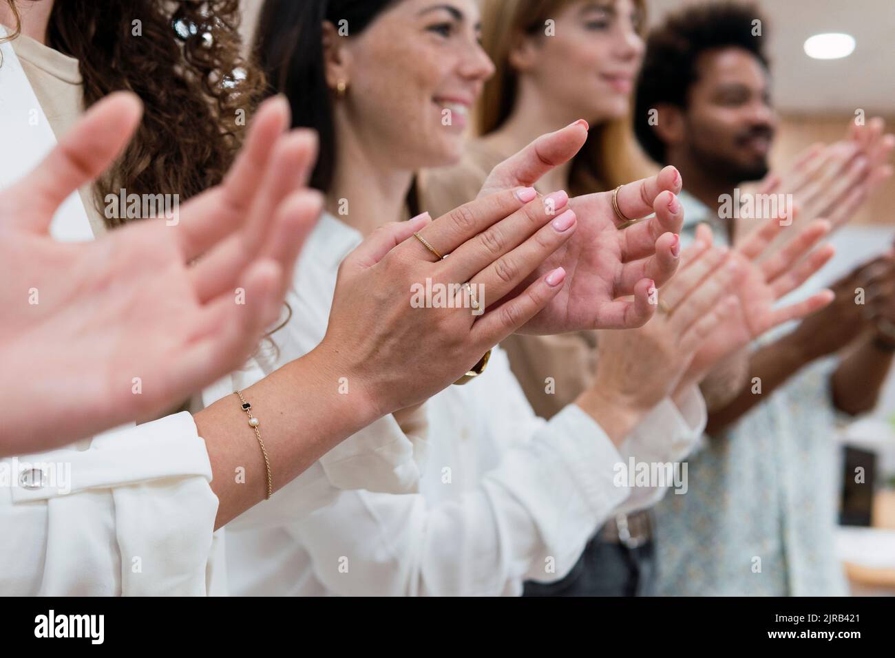 Business team clapping hands after a presentation in office Stock Photo ...