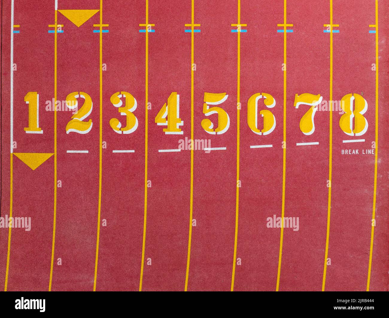 Aerial image of a new red running track lane numbers, 1 through 8, with ...