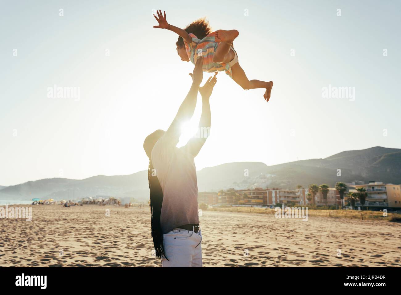 Man throwing child air catching hi-res stock photography and images - Alamy
