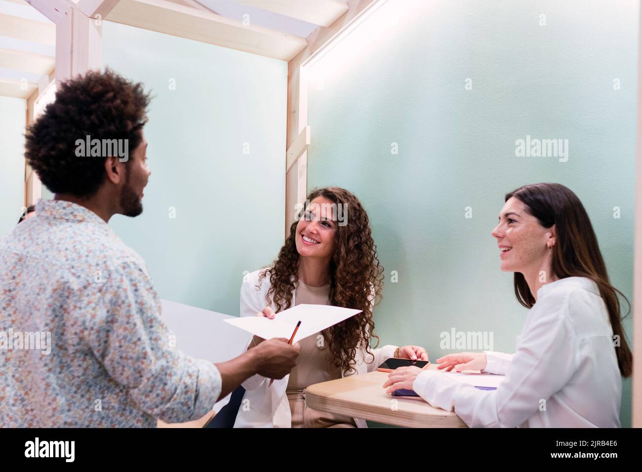Handing over documents hi-res stock photography and images - Alamy