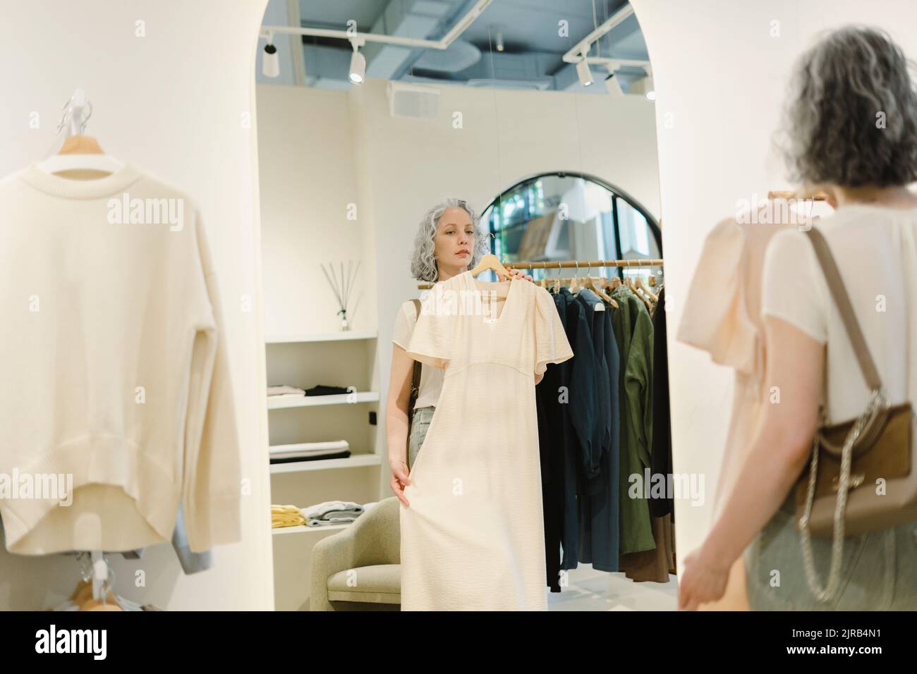 Mirror image dress hi-res stock photography and images - Alamy