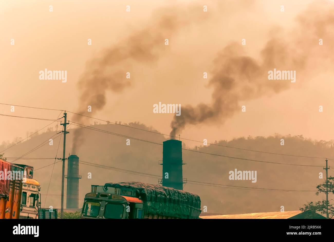 Dark smoke as a result of coal being burnt in furnaces, billowing out ...