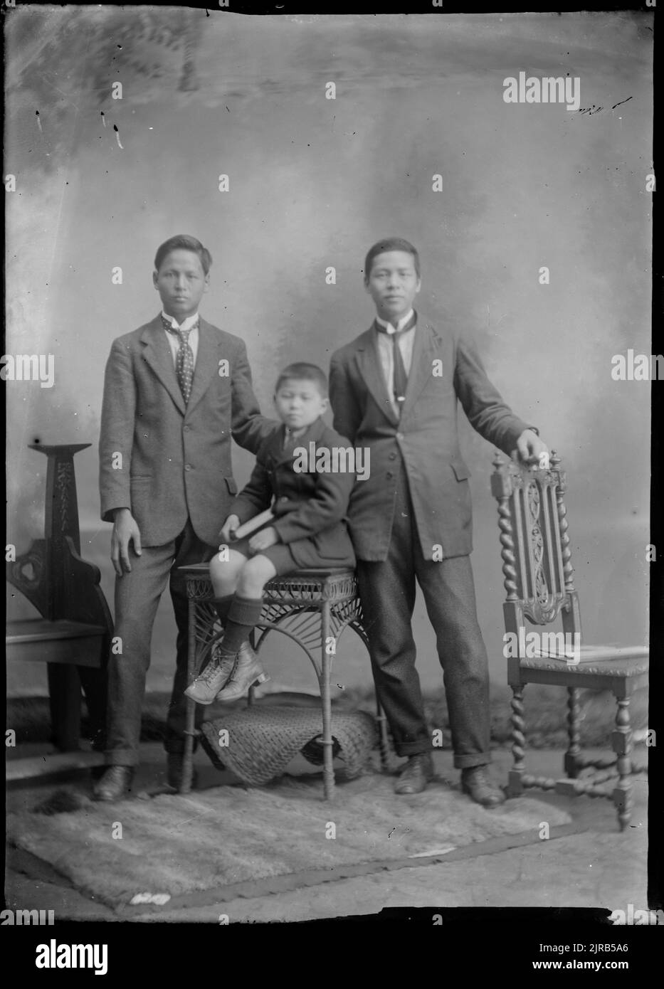 Two men and a boy, 1897-1914, Wellington, by Berry & Co Stock Photo - Alamy