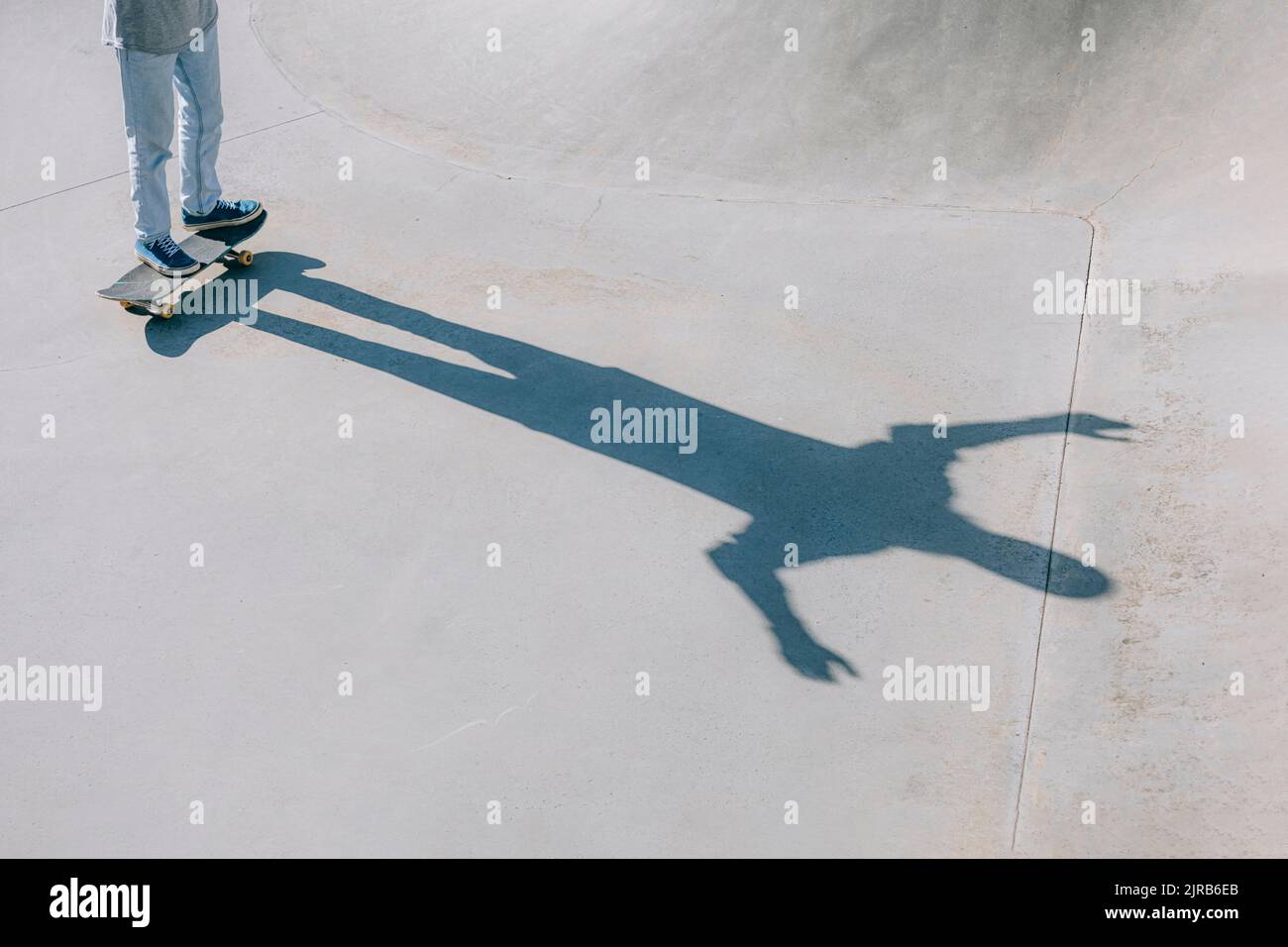 Shadow of man with outstretched arms hi-res stock photography and ...