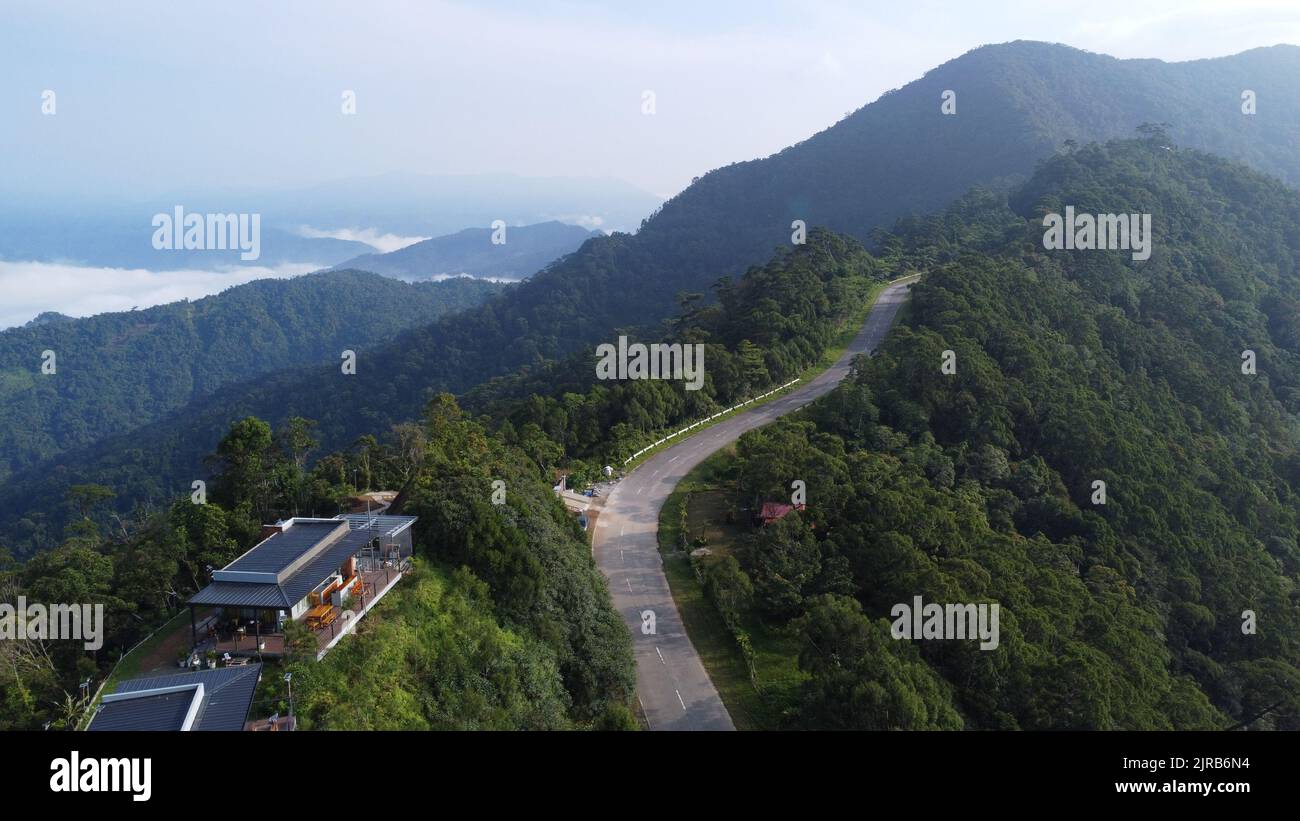 An aerial view of a hilltop vacation house and mountains in Real ...