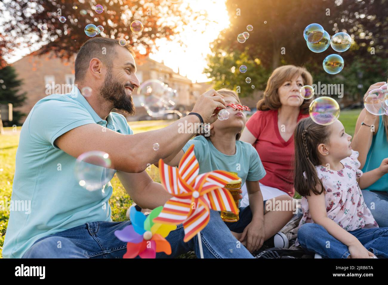 Grandmother children bubbles hi-res stock photography and images - Alamy