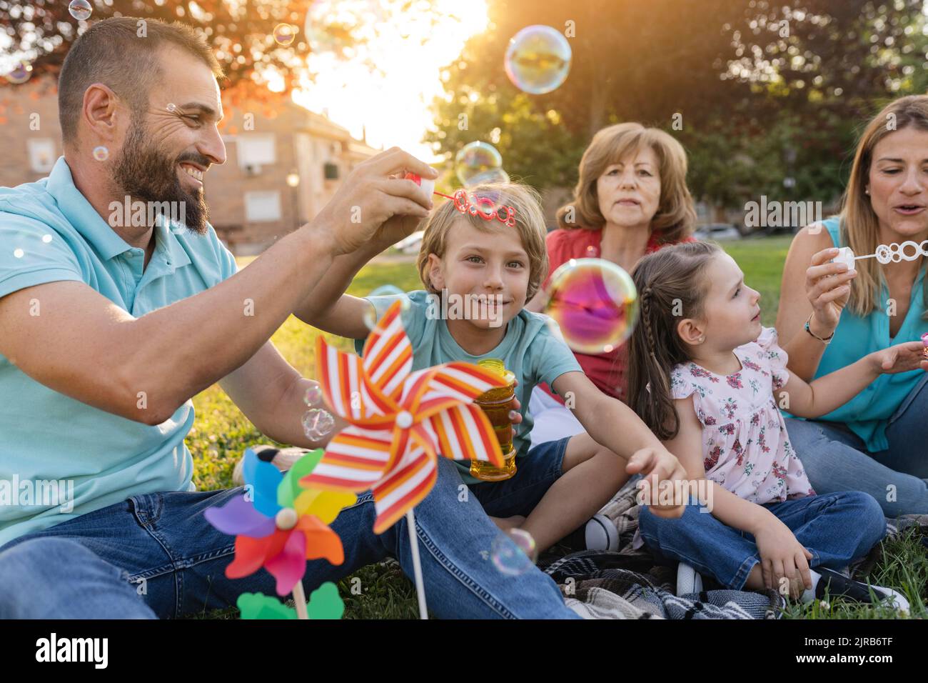 Girl mother blowing bubbles hi-res stock photography and images - Alamy