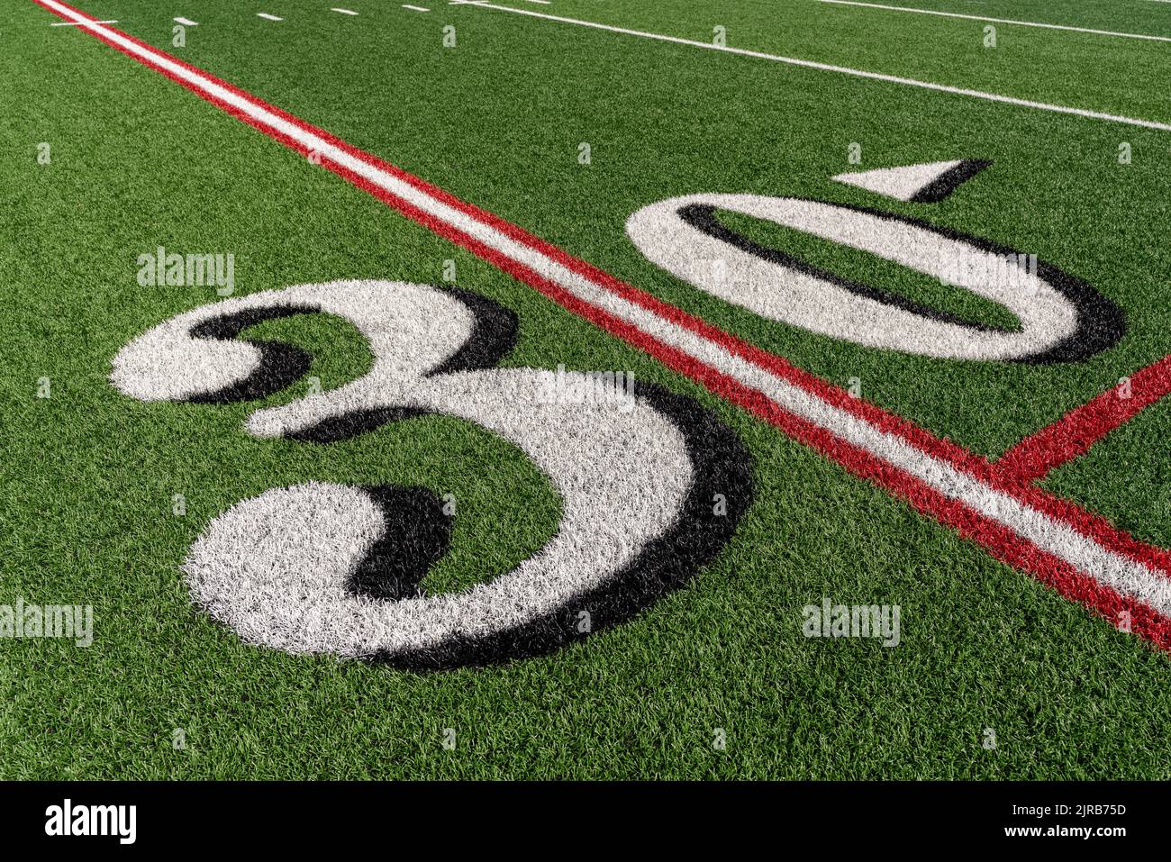 Synthetic turf slanted football 30 yard line in white with black number ...