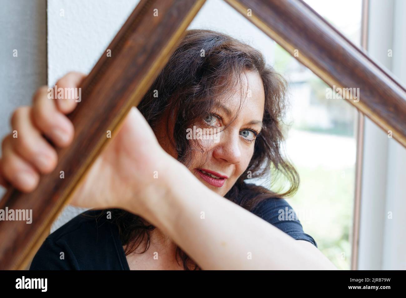 Female view through frame hi-res stock photography and images - Alamy