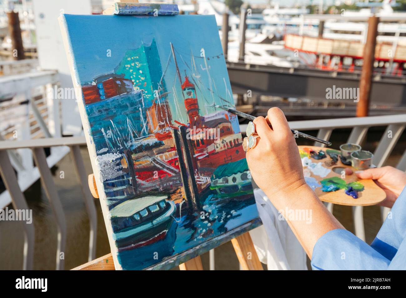 Hand artist paintbrush painting hi-res stock photography and images - Alamy