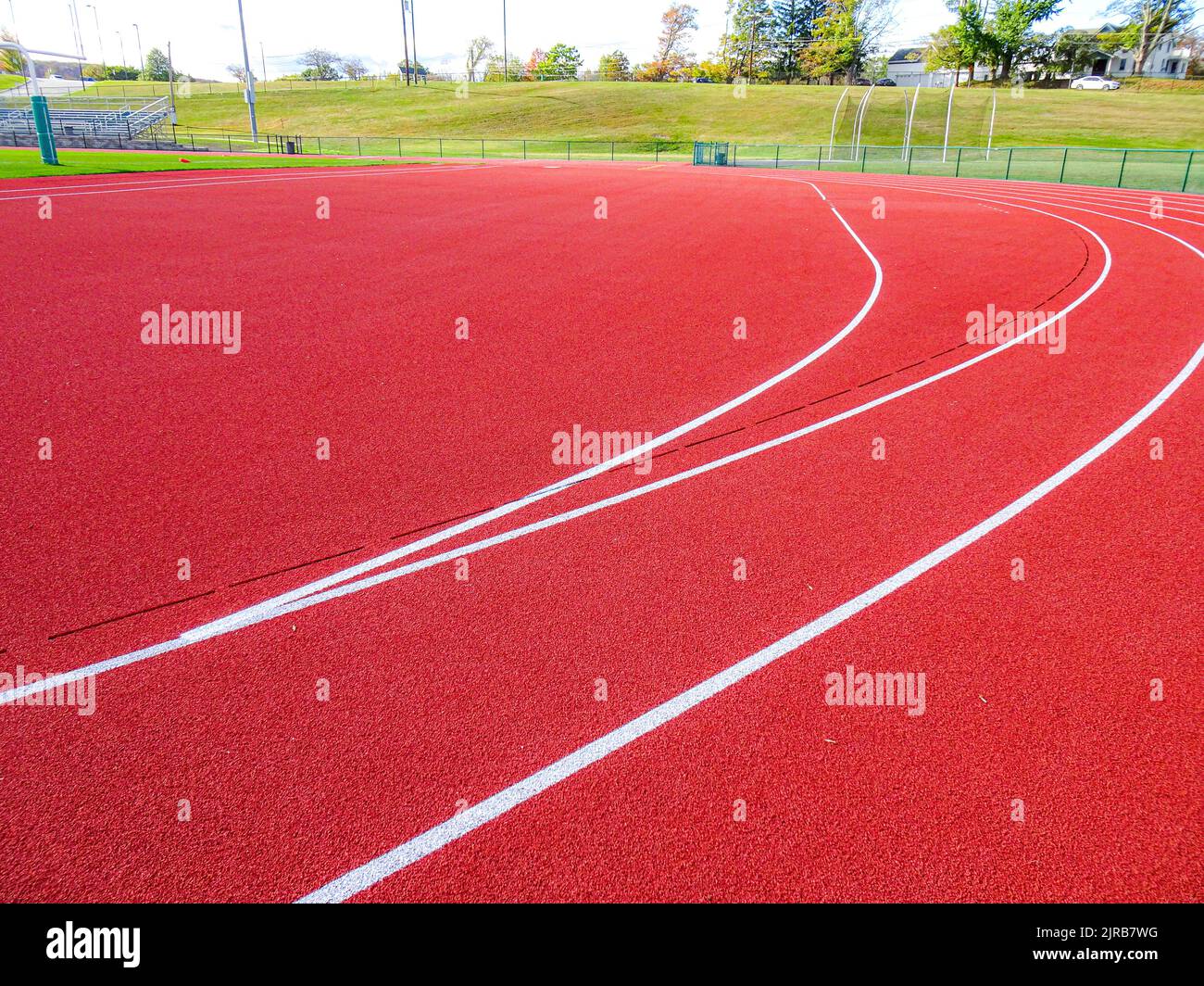 Running track slot drain along radius, adjacent to steeplechase Stock ...