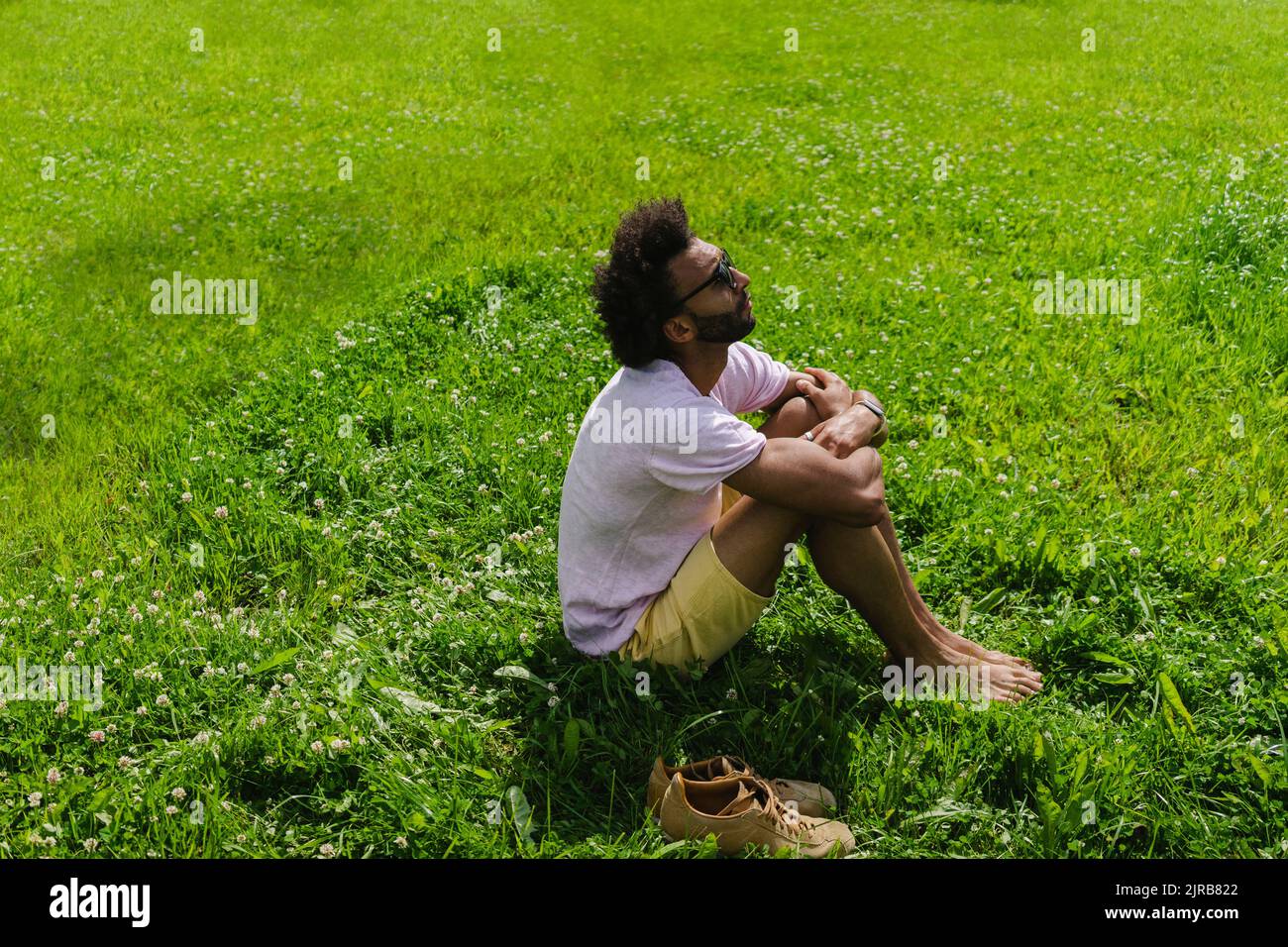 Male hugging knees hi-res stock photography and images - Alamy