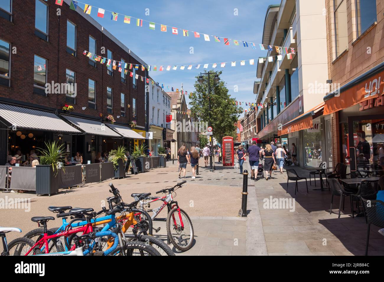 Shops and shoppers in High street, worcester, UK Stock Photo - Alamy