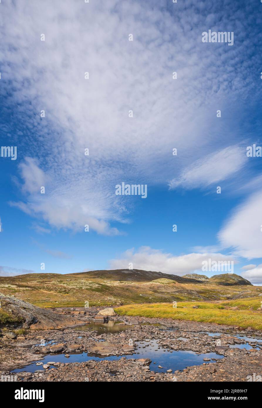 Norway, Clouds over stream in Hardangervidda National Park Stock Photo ...
