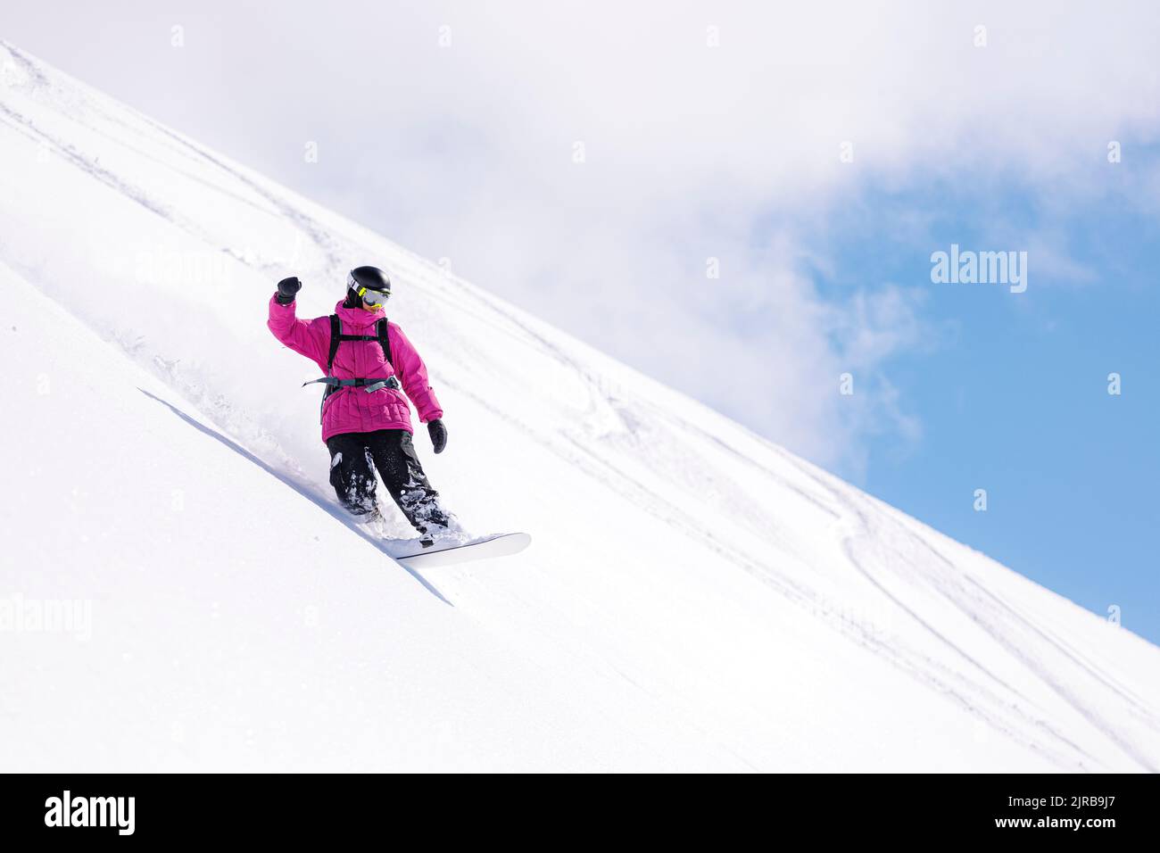 Mid adult male skiing on slope hi-res stock photography and images - Alamy