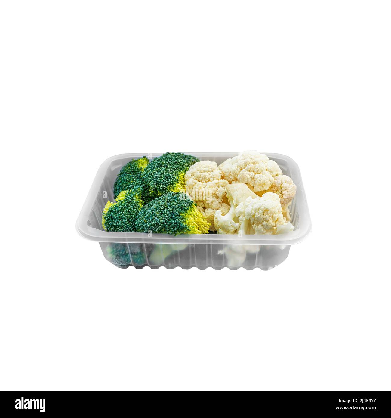 lot of broccoli and cauliflower on the table in a plastic box on an ...
