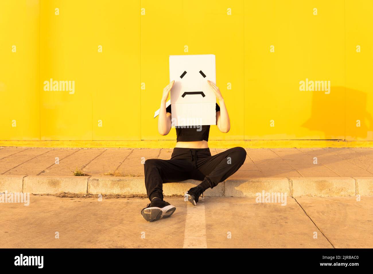 Wearing cardboard box sad face hi-res stock photography and images - Alamy