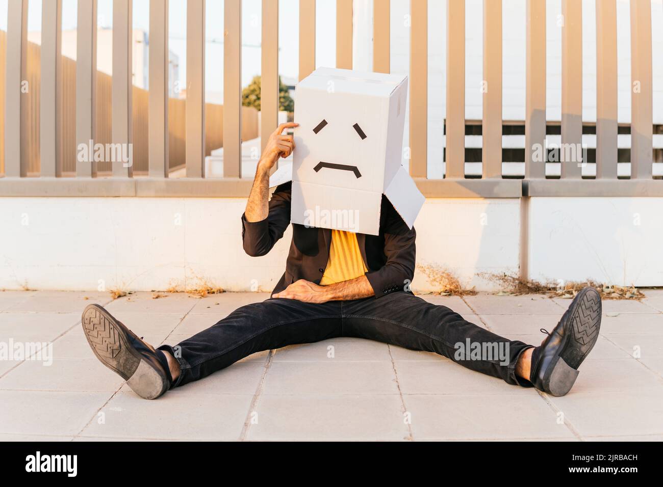 Wearing cardboard box sad face hi-res stock photography and images - Alamy