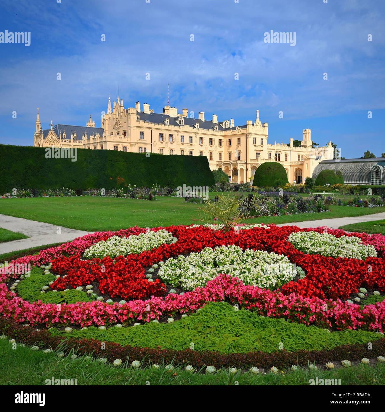 Lednice Chateau with beautiful gardens and parks on sunny summer day ...