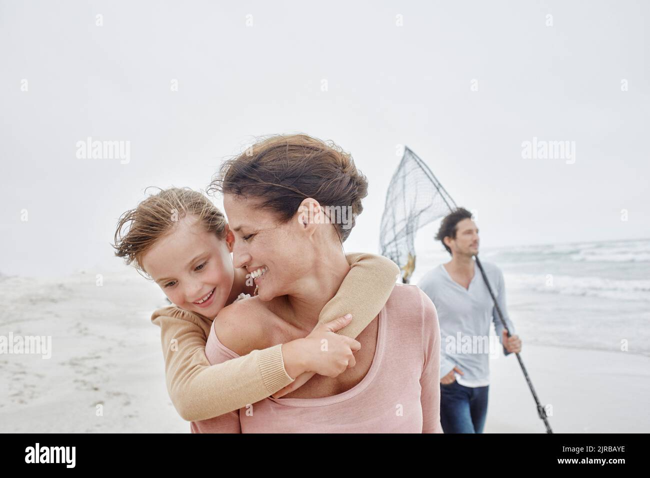 Woman fishing with net beach hi-res stock photography and images - Alamy