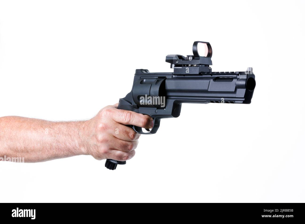 Hand of man shooting with revolver against white background Stock Photo ...