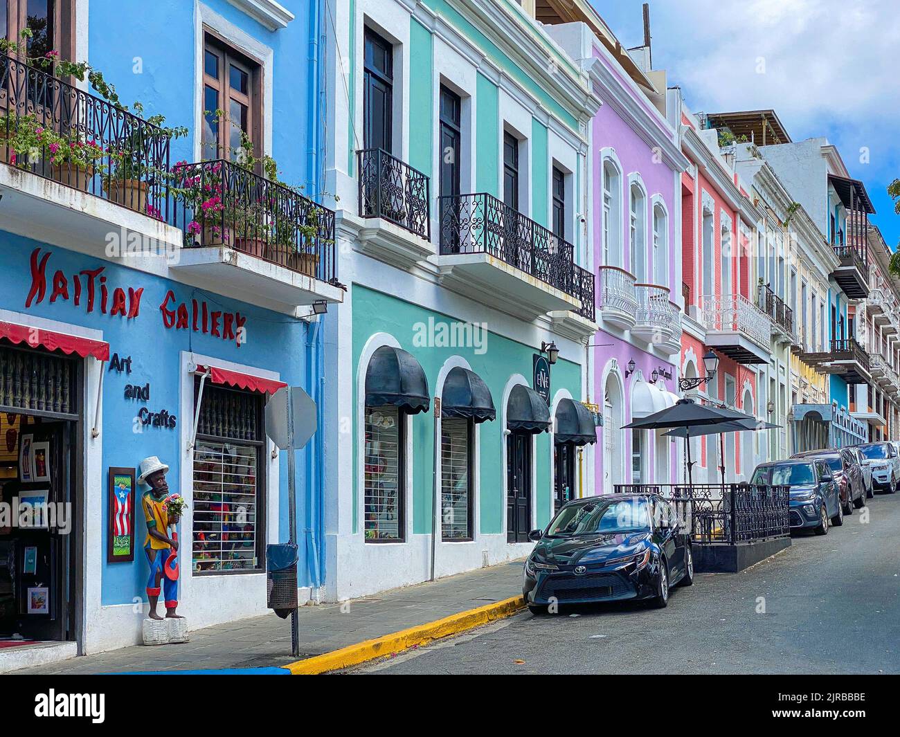 A view of local shops in downtown San Juan Stock Photo - Alamy