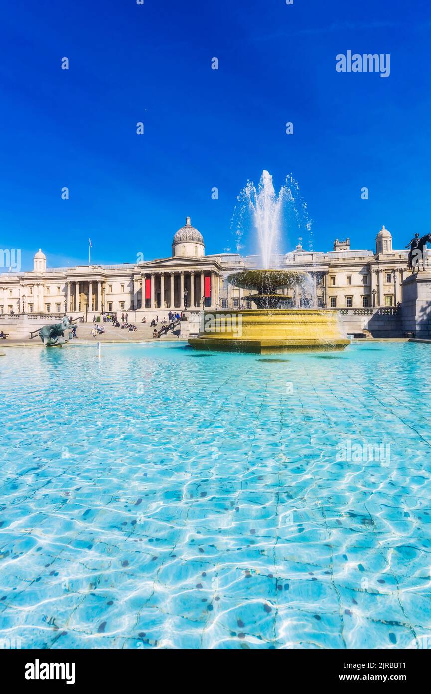UK, England, London, Fountain at Trafalgar Square with National Gallery ...