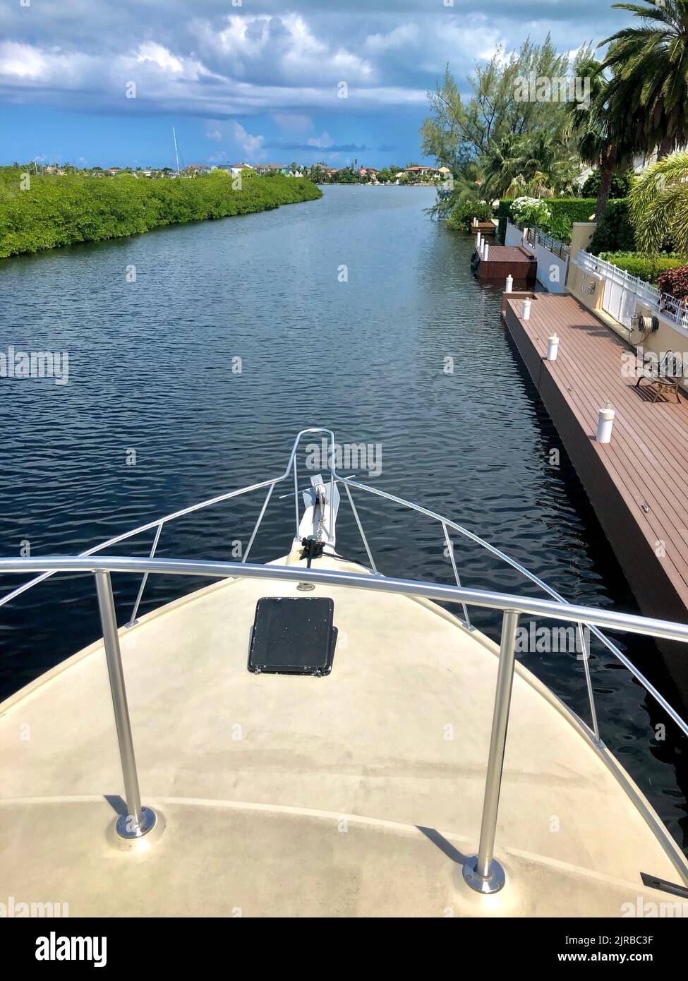 Picture showing the front of a boat facing river outlet in Grand Cayman ...
