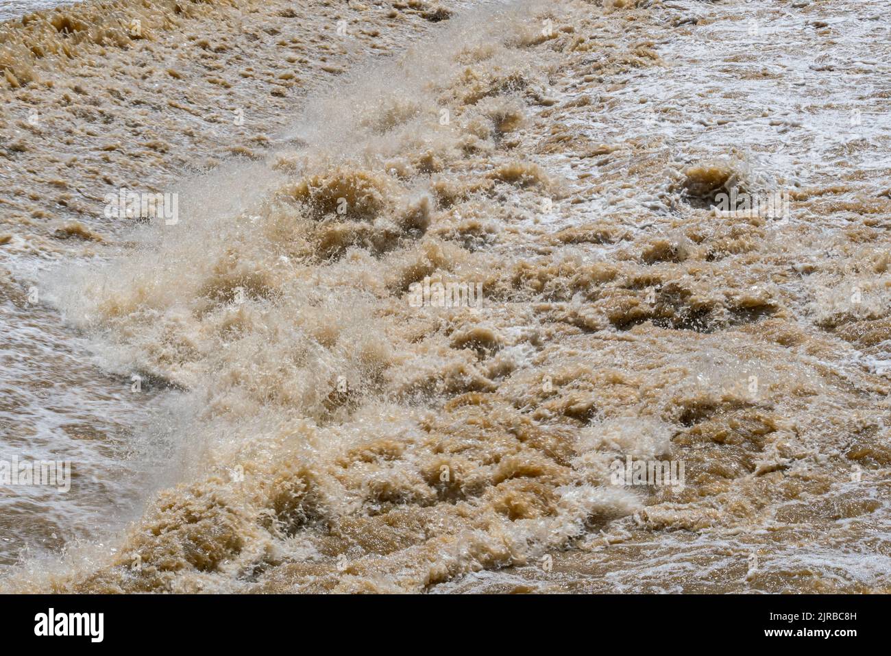 Rapids on the river after heavy rain in rainy season. Muddy water ...