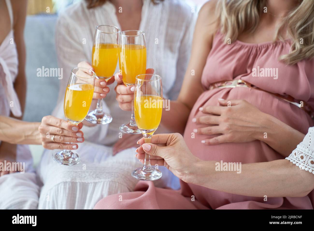 Friends pregnant holding hands hi-res stock photography and images - Alamy