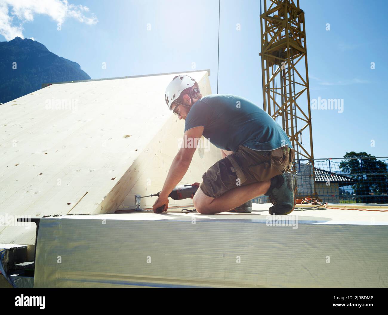 Carpenter installing roof hi-res stock photography and images - Alamy