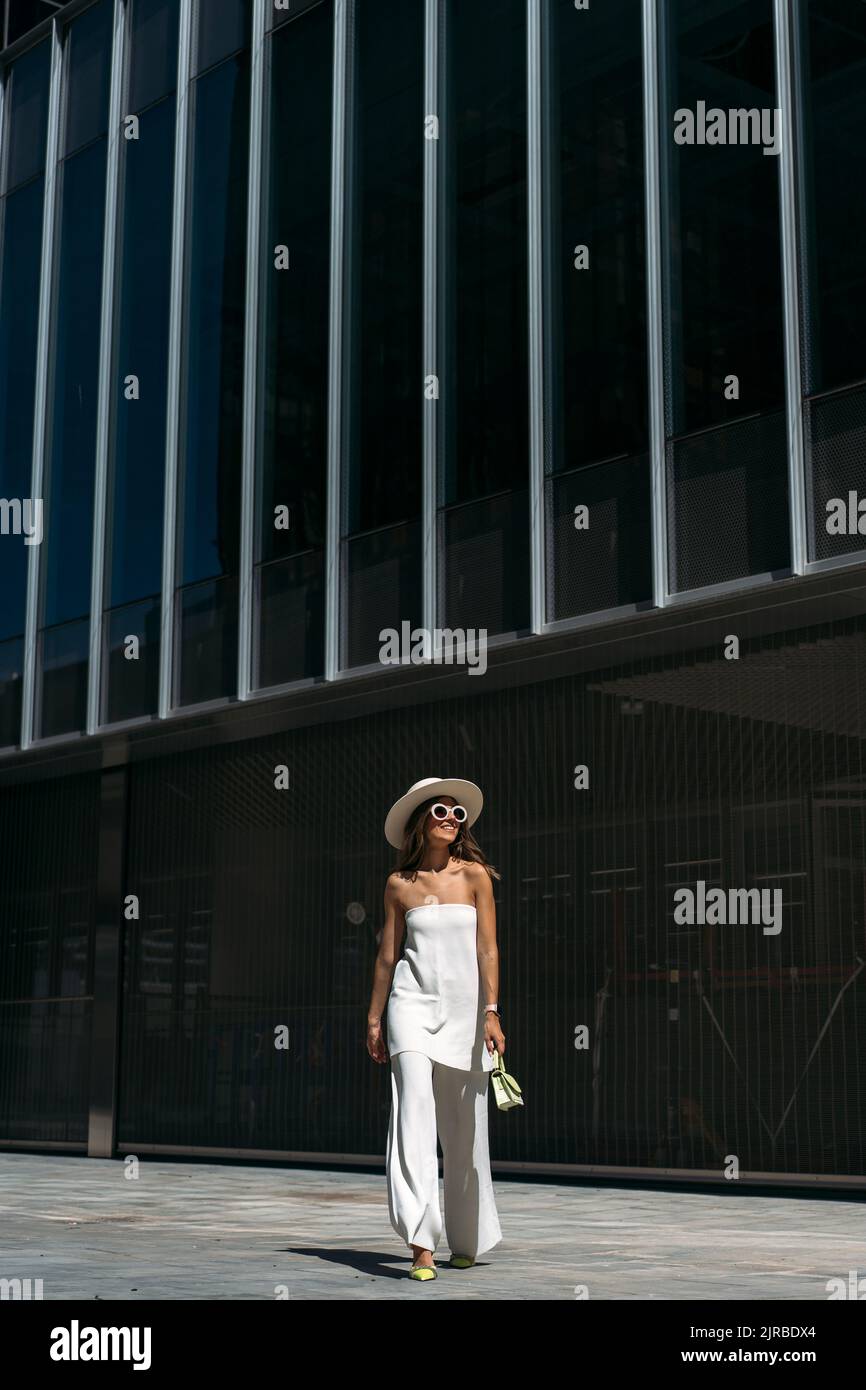 Woman walking outside hi-res stock photography and images - Alamy