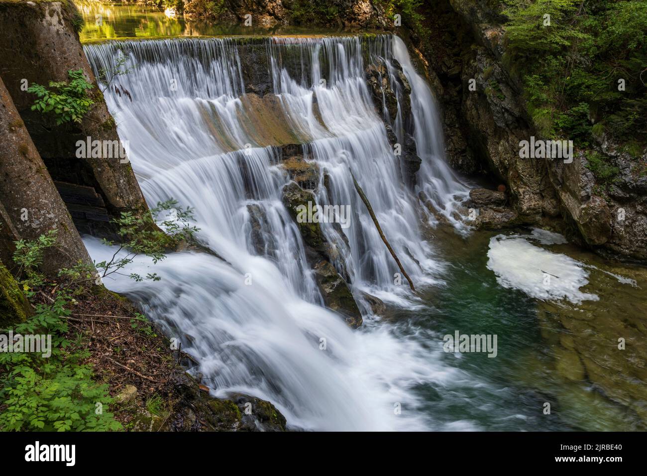 Slovenia, Long exposure of waterfall on Radovna river flowing through ...