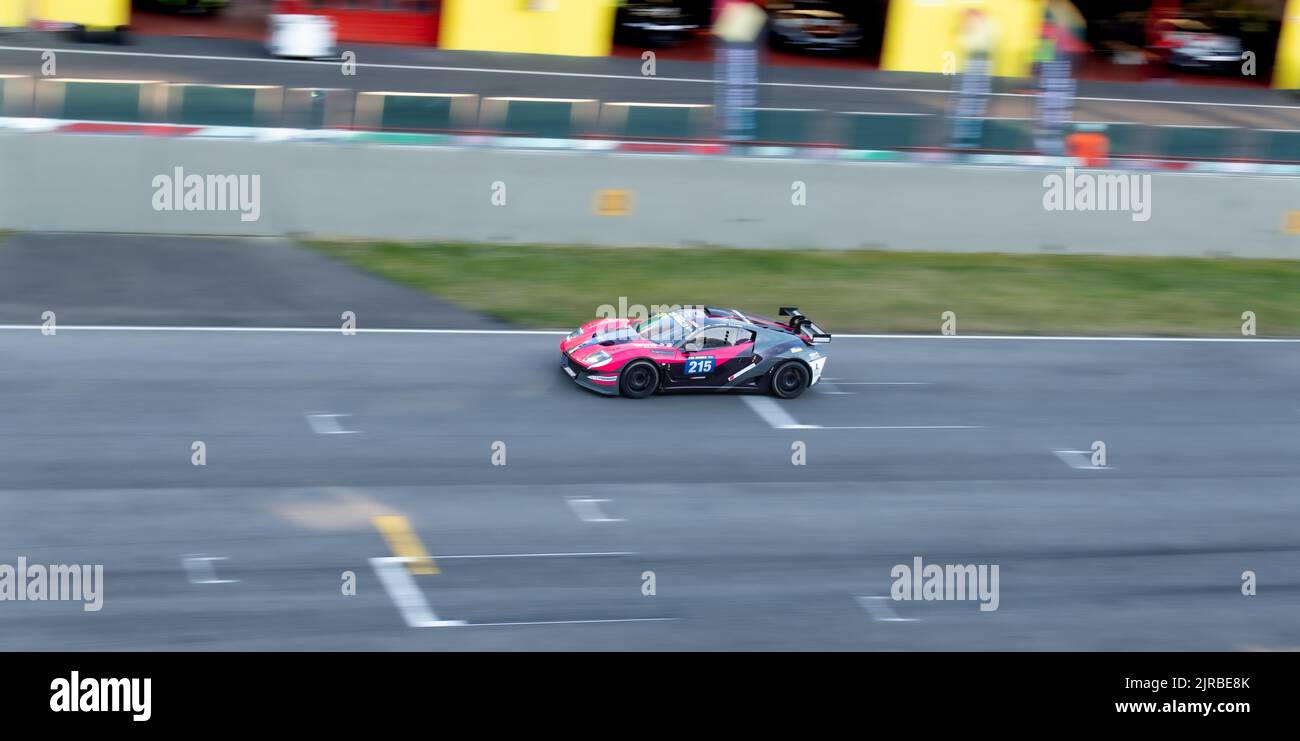 Speed concept Ligier J2S racing car fast on racetrack blurred motion ...