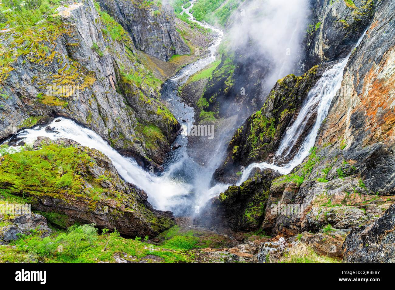 Norway, Vestland, Scenic view of Voringfossen waterfall splashing down ...