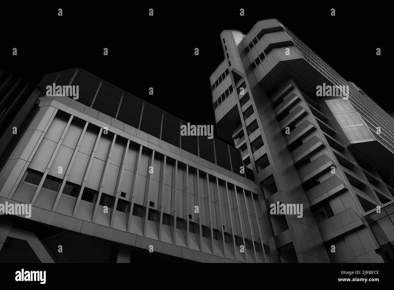 Singapore, Exterior of modern building at night Stock Photo - Alamy