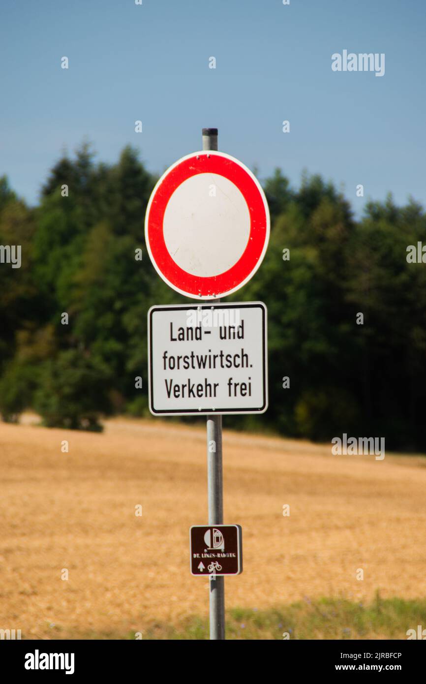 A vertical shot of agriculture traffic sign in German Stock Photo - Alamy