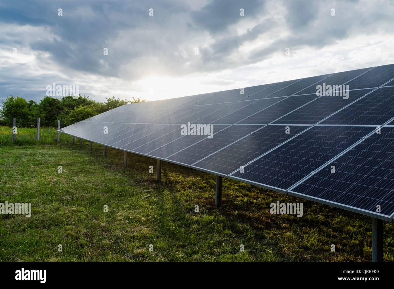 Solar panels on field at Power Station Stock Photo - Alamy