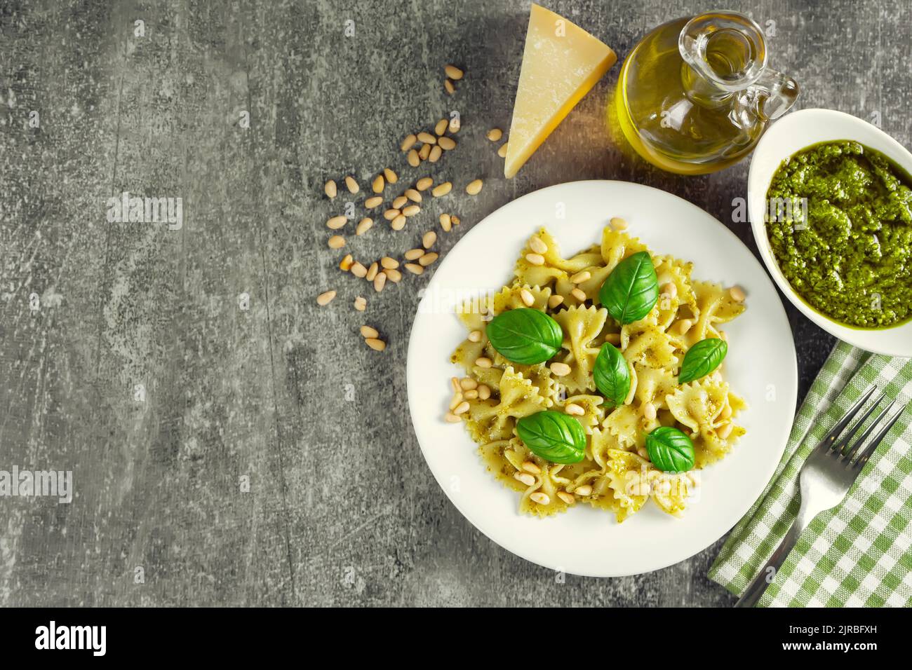 Traditional italian pasta with fresh vegetables, parmesan cheese, basil ...