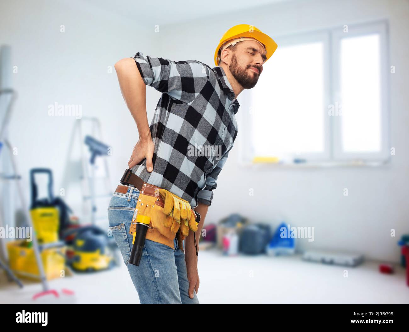 male worker or builder having back ache Stock Photo - Alamy