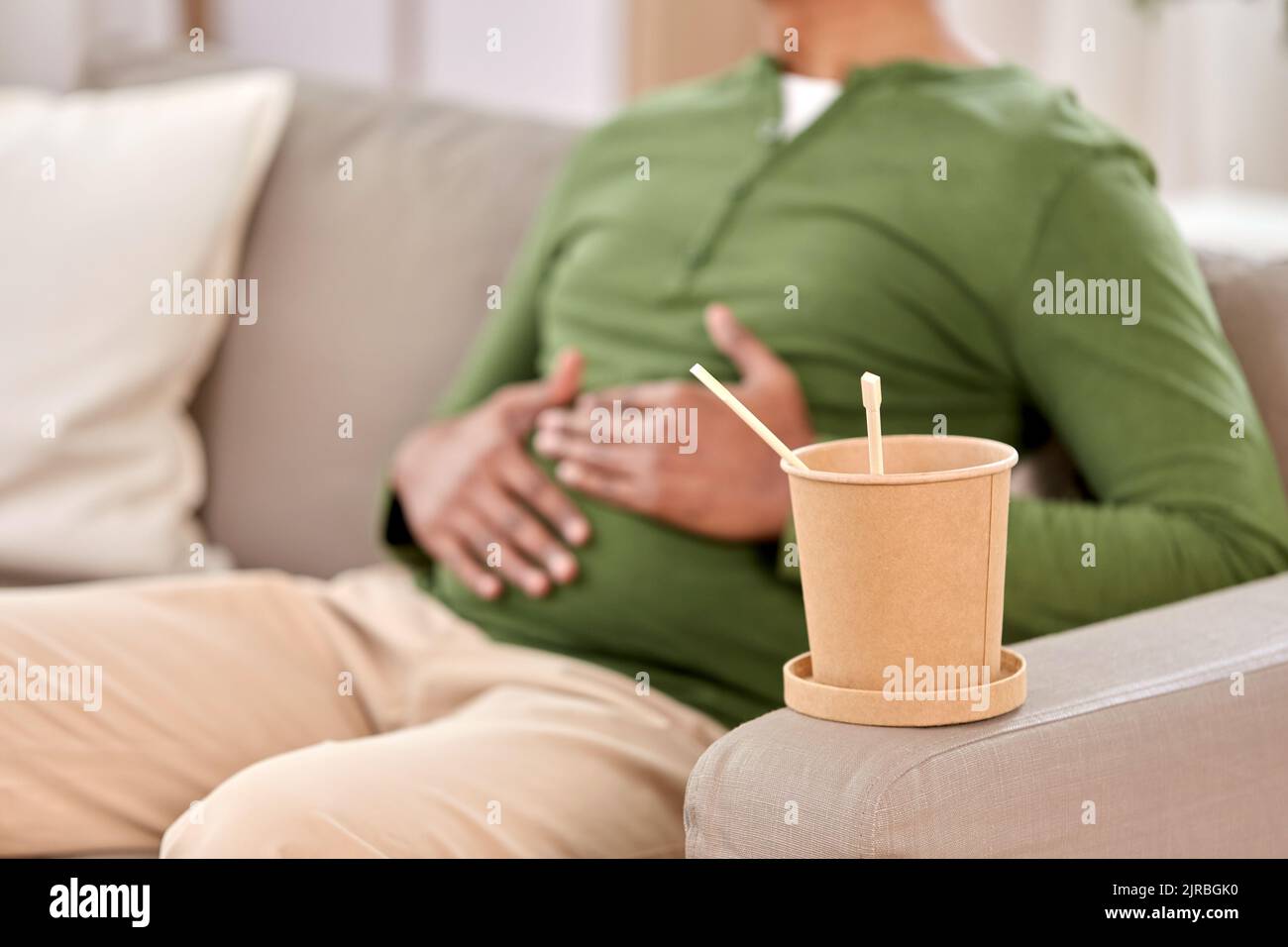 Over food consumption hi-res stock photography and images - Alamy